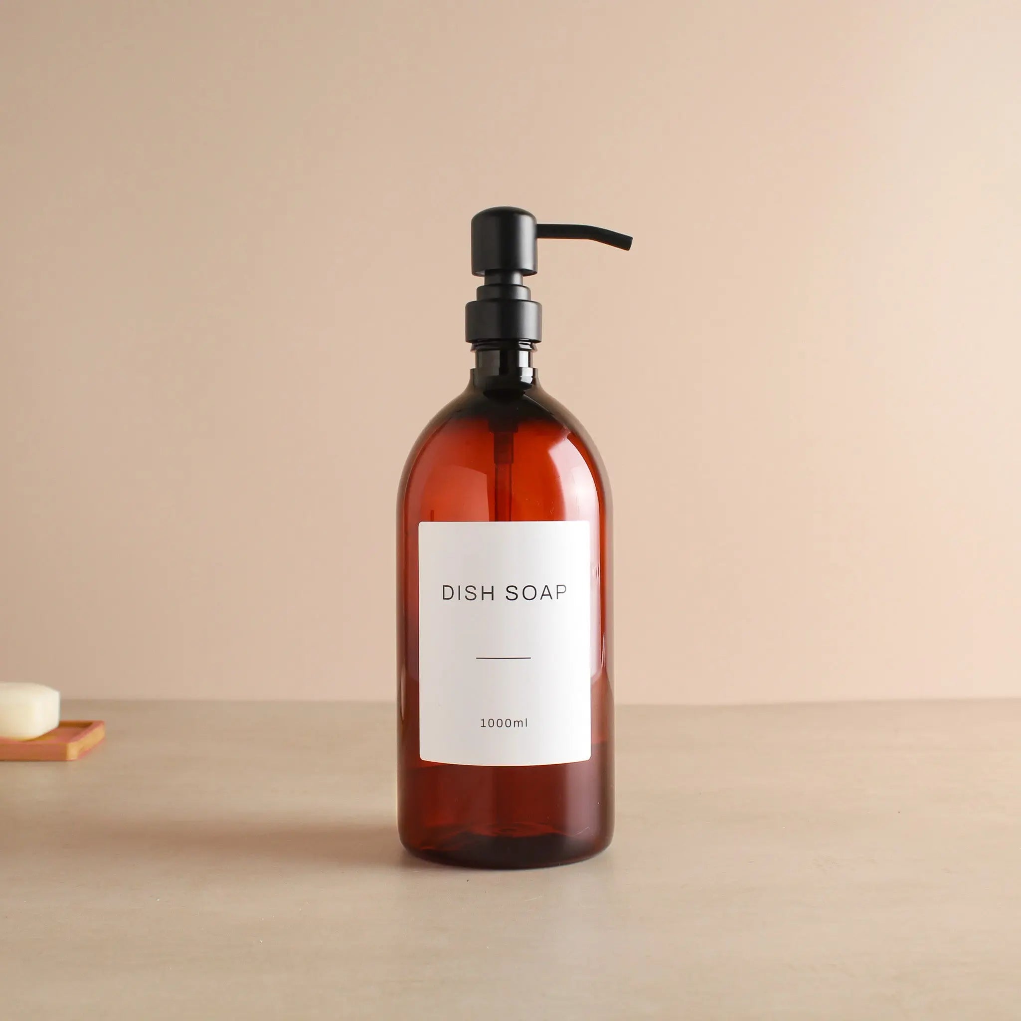 Labelled Amber Plastic Dispenser Bottle With Matte Black Pump – Myza